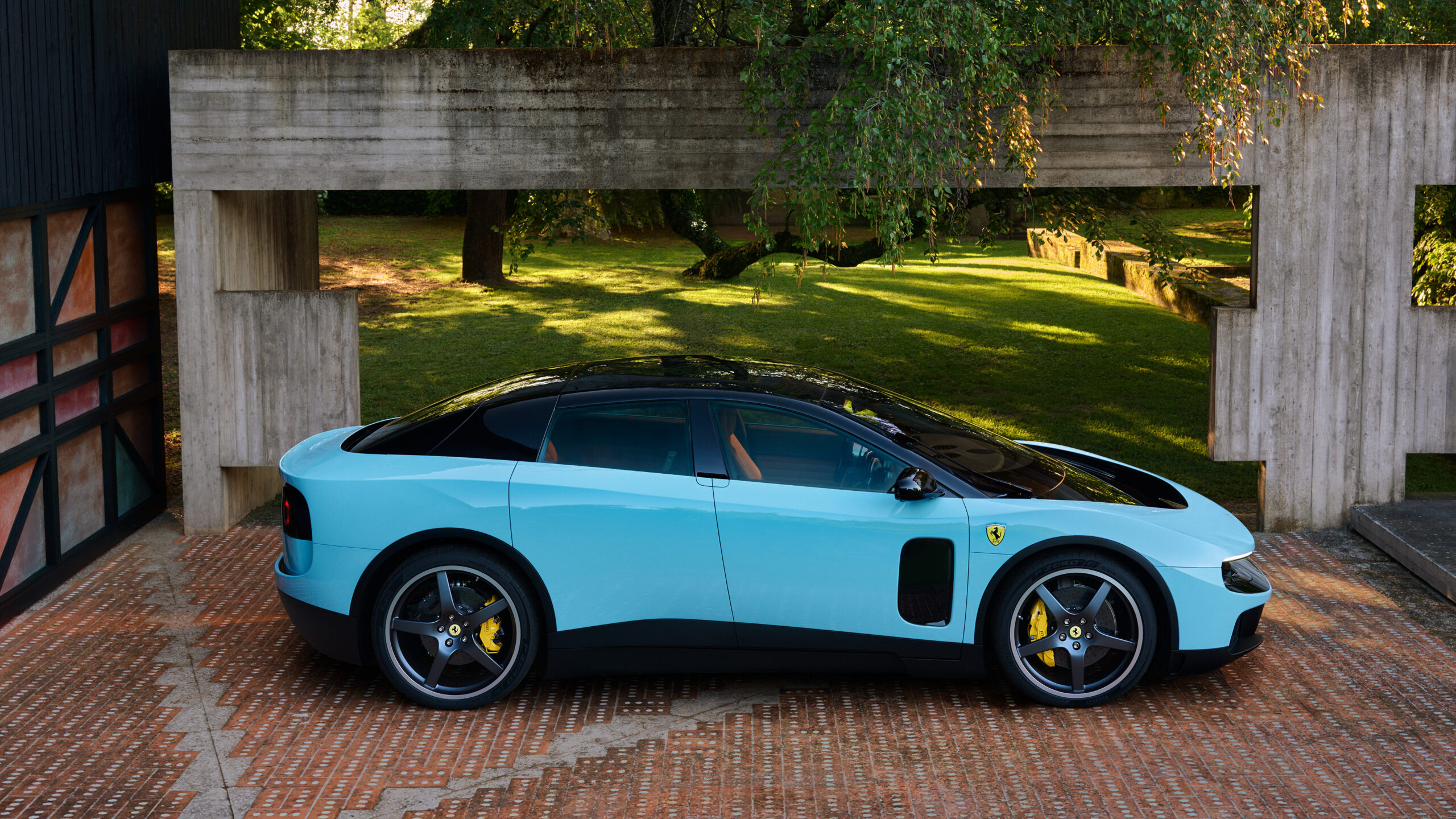 Ferrari Introduces Battery-Powered, Four-Door Model